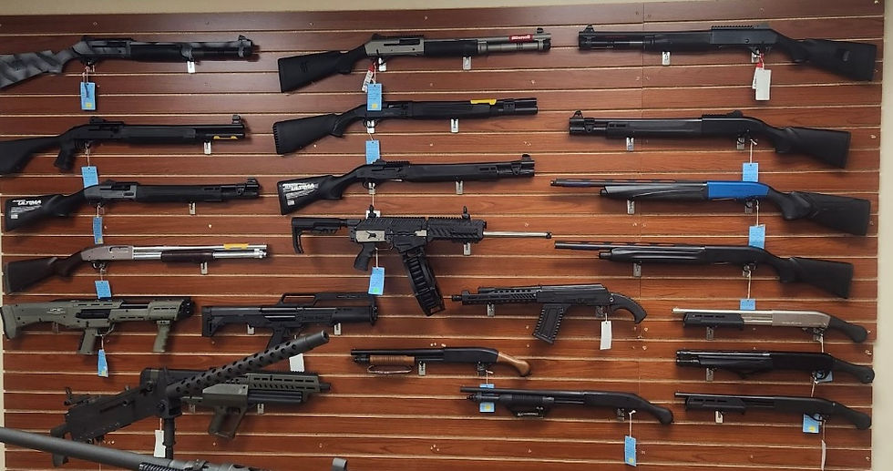 Just the small wall filled with Tactical Shotguns .. Benelli - Beretta ...