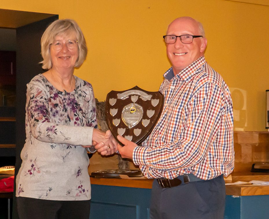 Trevor Lane won the Monthly Competitions print trophy, presented Jane ...