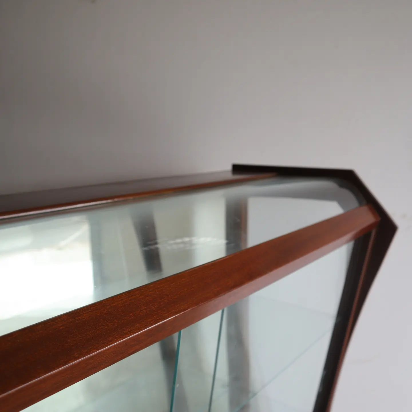 Mid-Century sapele curved glass display cabinet with solid brass feet ...