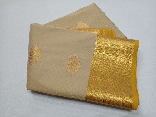Mustard colour border with cream colour Jari putta design | Nithiya Silks