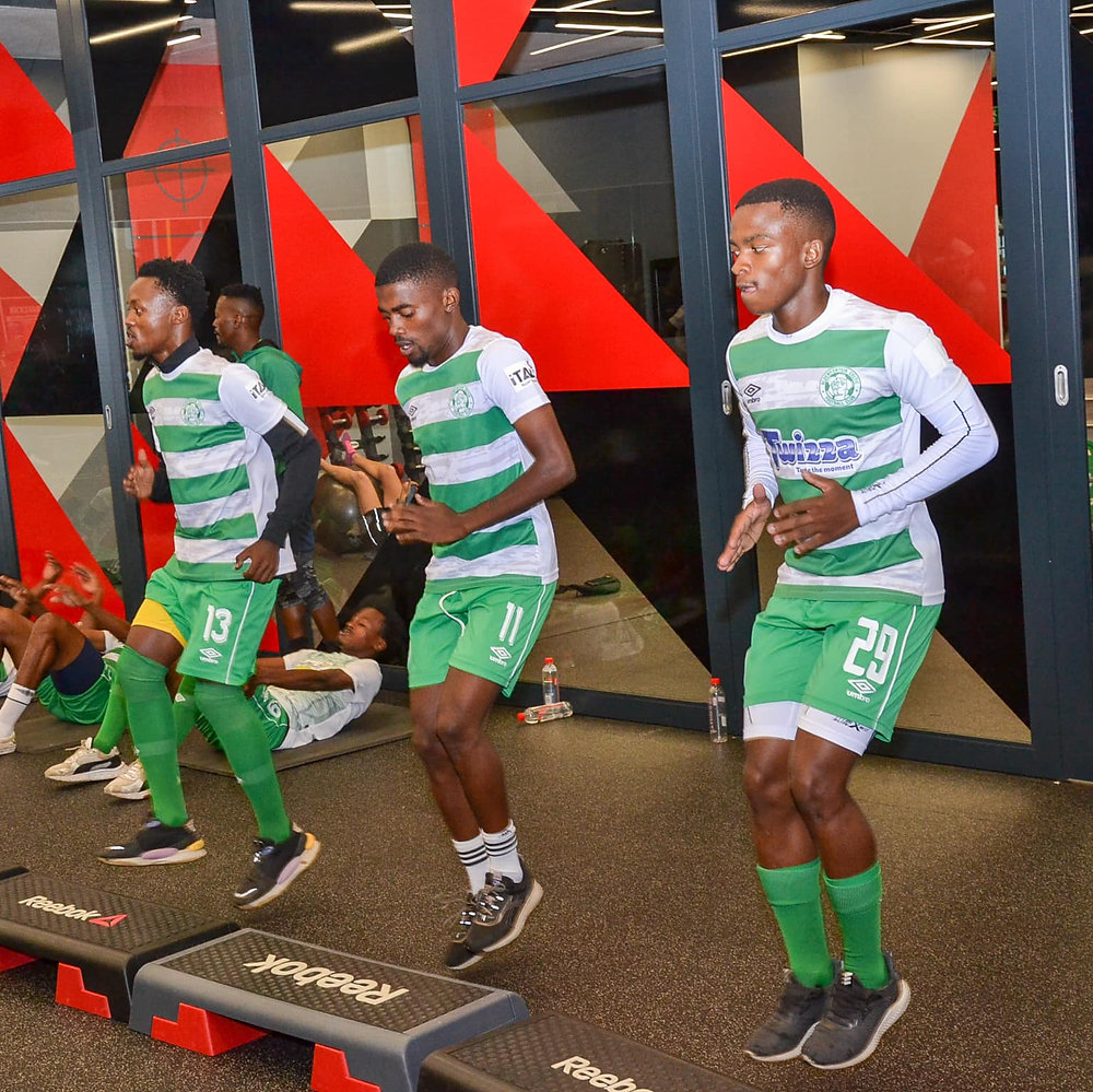 Local Football Team Prepares for Premier's Cup with Intense Gym Session