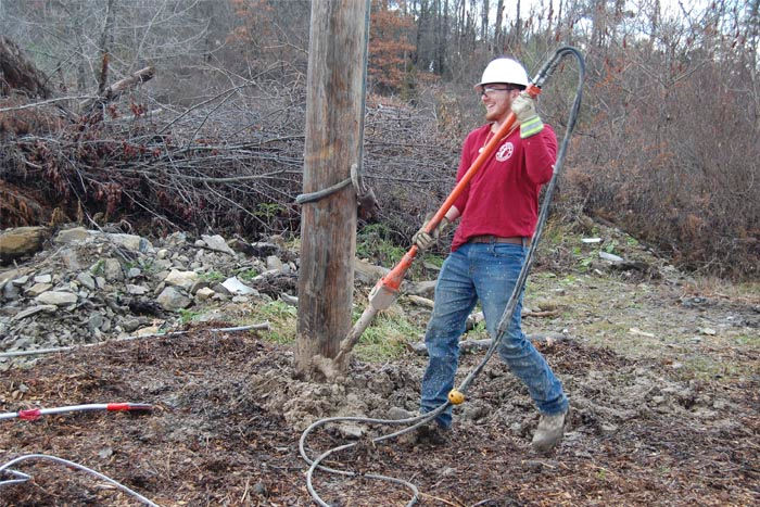 What does a lineman ground hand do