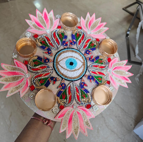 Rangoli with peacock and evil eye | Indietaufa