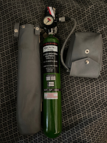 Therapeutic Oxygen bottle and mask | Doors2Manual