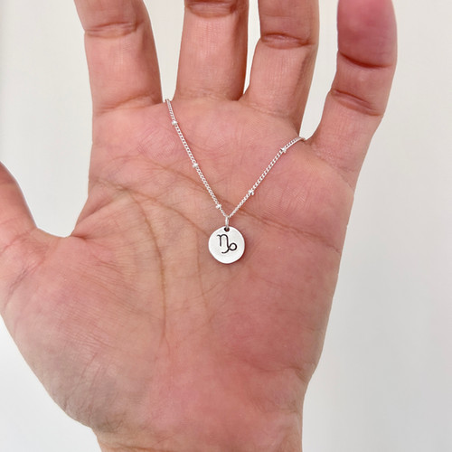 'Sterling Silver Star Sign Necklace with Zodiac Symbol'