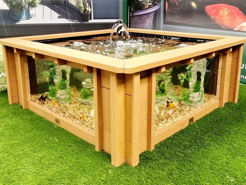 Raised Square Pond above and below ground with large windows - Lotus ...