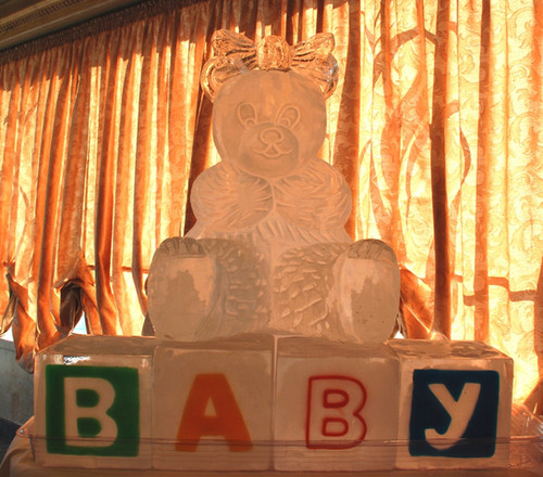 Teddy Bear with Bow on Colored Baby Blocks | ice and fruits