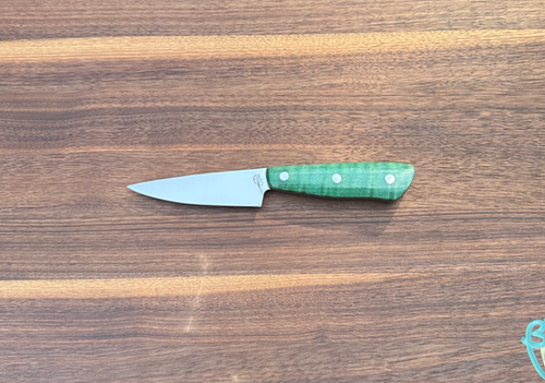 Green curly maple paring | Burls and Steel