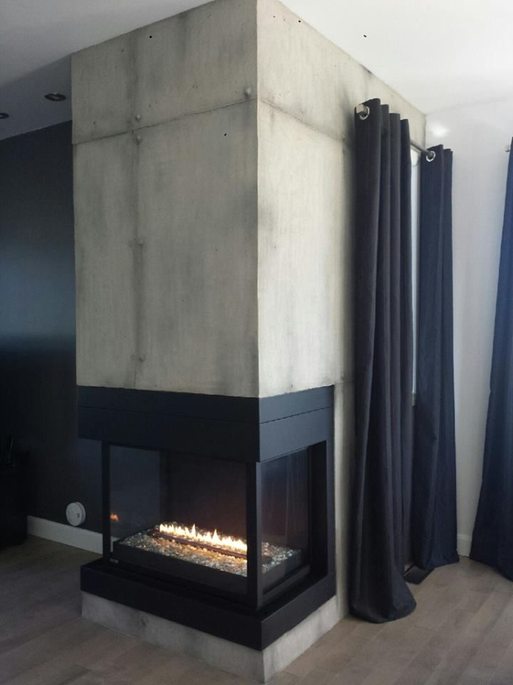 Foyer et mur effet béton | Fini acier avec boulons | Yan Pigeon