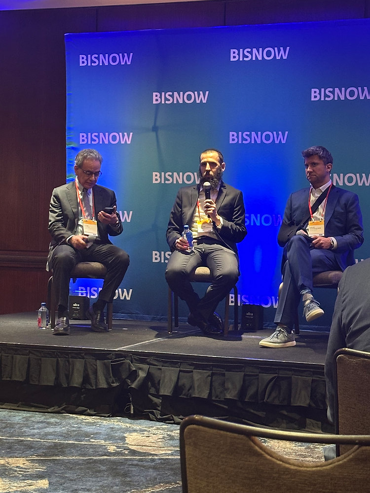 Eli Meltzer Featured on City of Yes Panel at Bisnow Conference