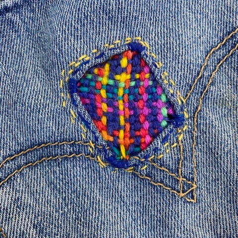 Weaving a small visible mending patch using a weaving loom kit - make ...