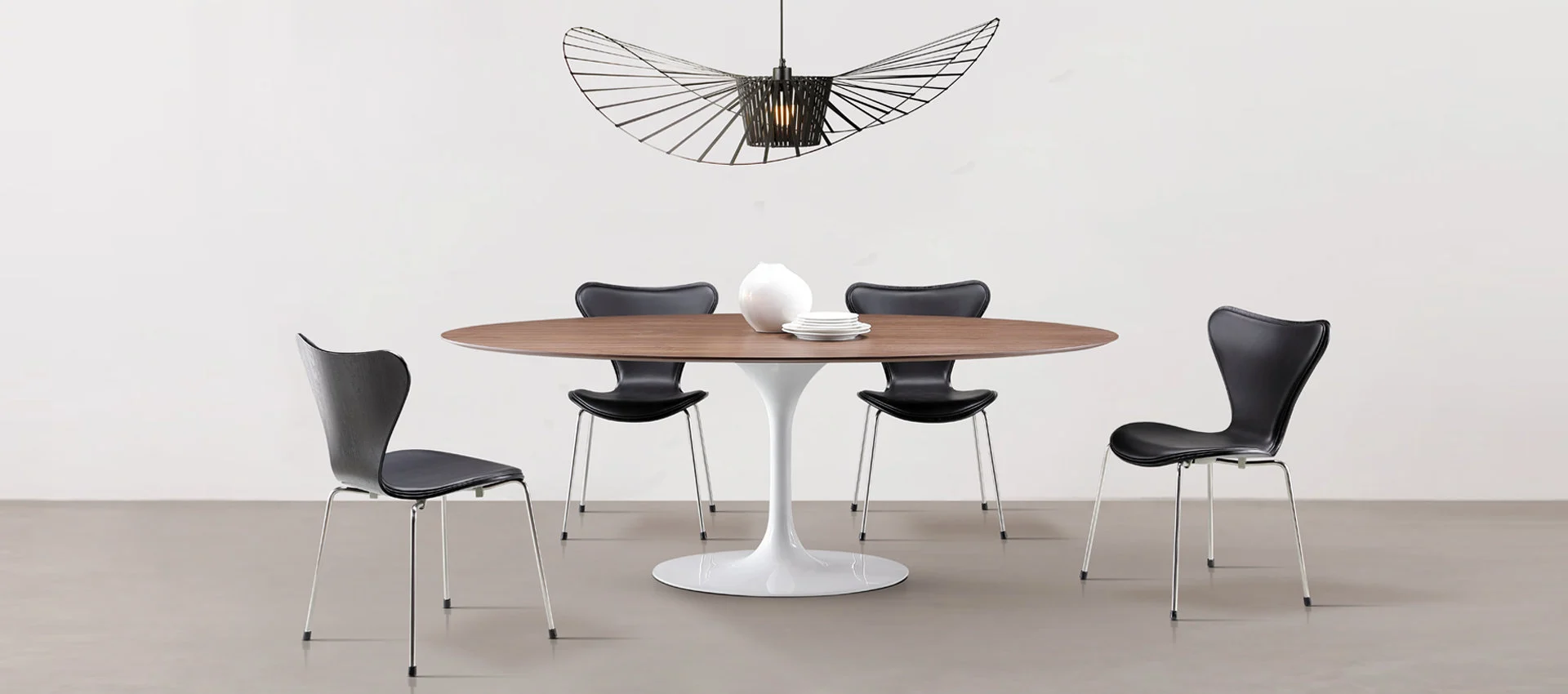 Trumpet Oval Dining Table with Venner Top | Elite Living