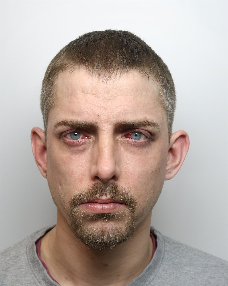 Leek man jailed after pushing two police officers down stairs following ...