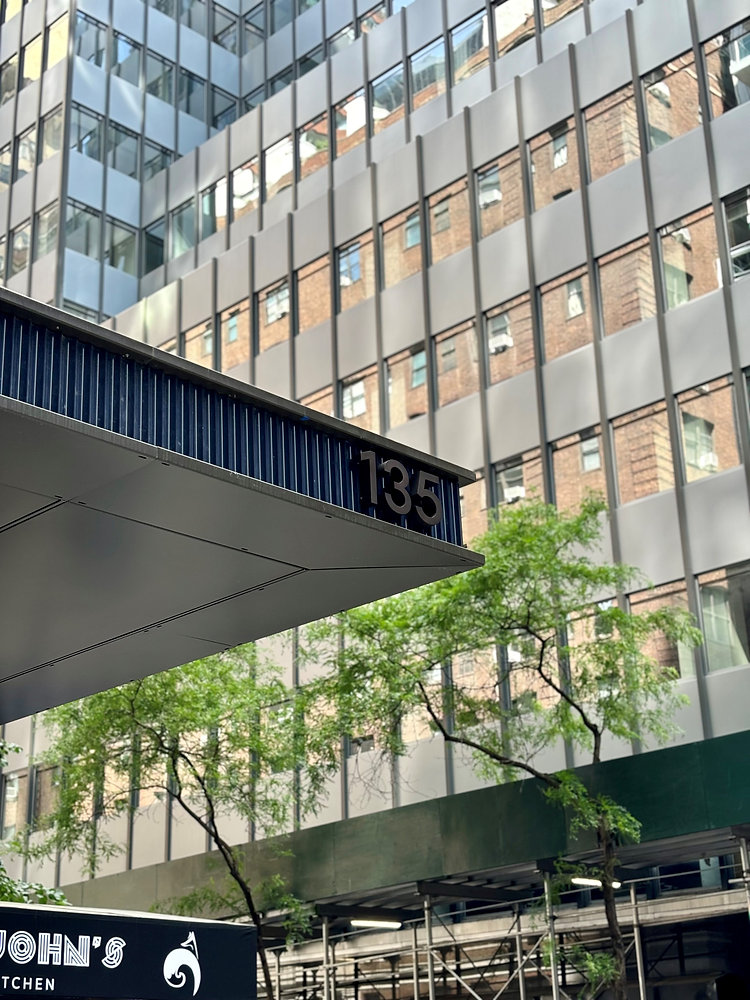 The canopy signage is installed and the sidewalk is done at 47th Street
