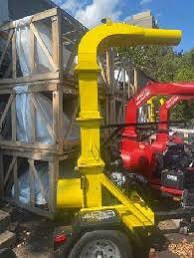 The Yellow Machine 31 hp tow behind leaf loader vac | Merit Hardware Inc.