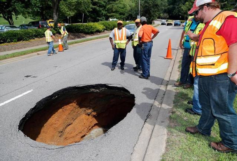 Small Sinkhole Located on Road Way