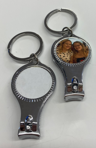 Nail clipper, bottle opener, nail file key chain | Moe’s on Main