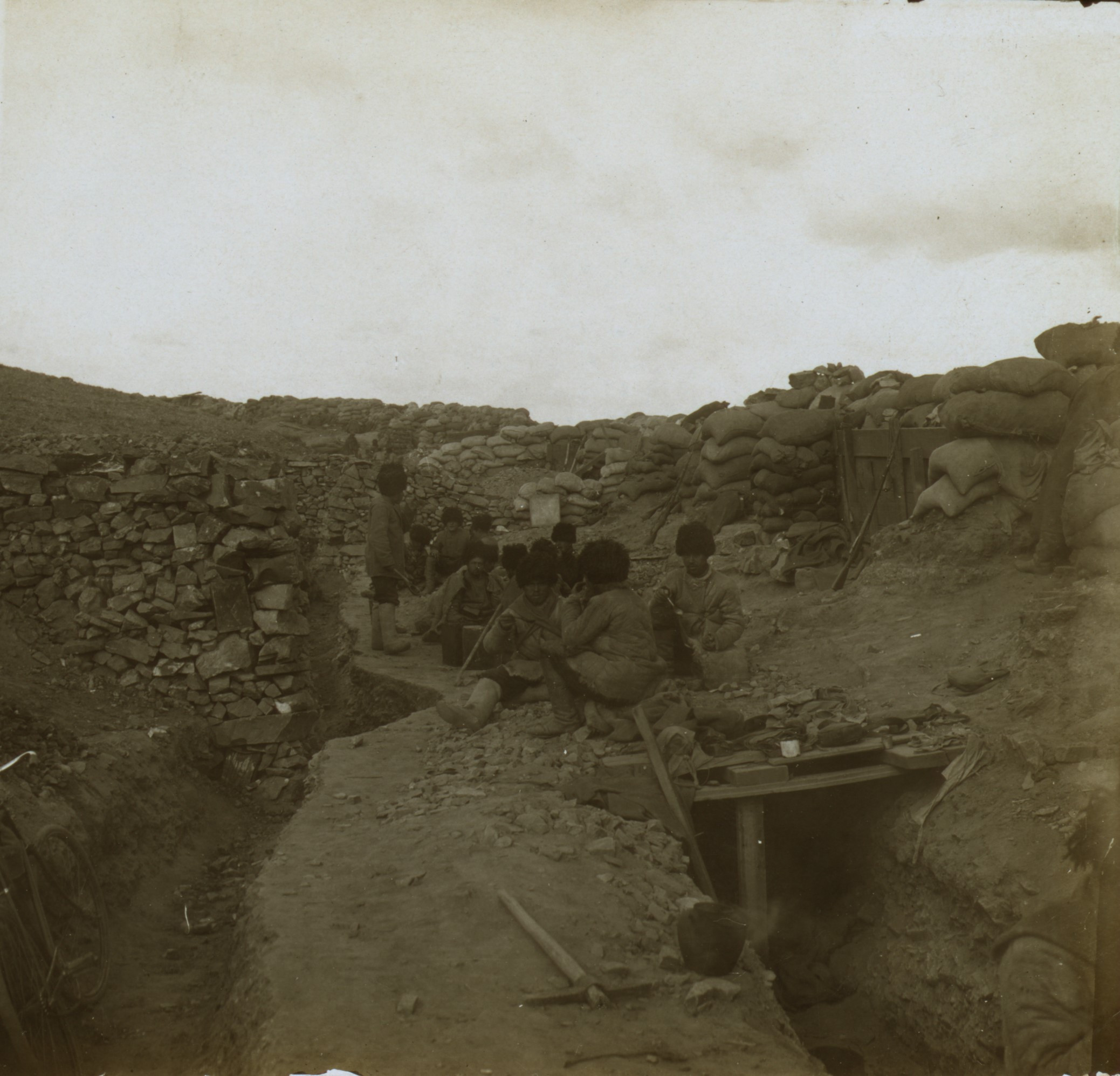 Eating their noonday soup in a Russian trench near the "Eagle's Nest ...