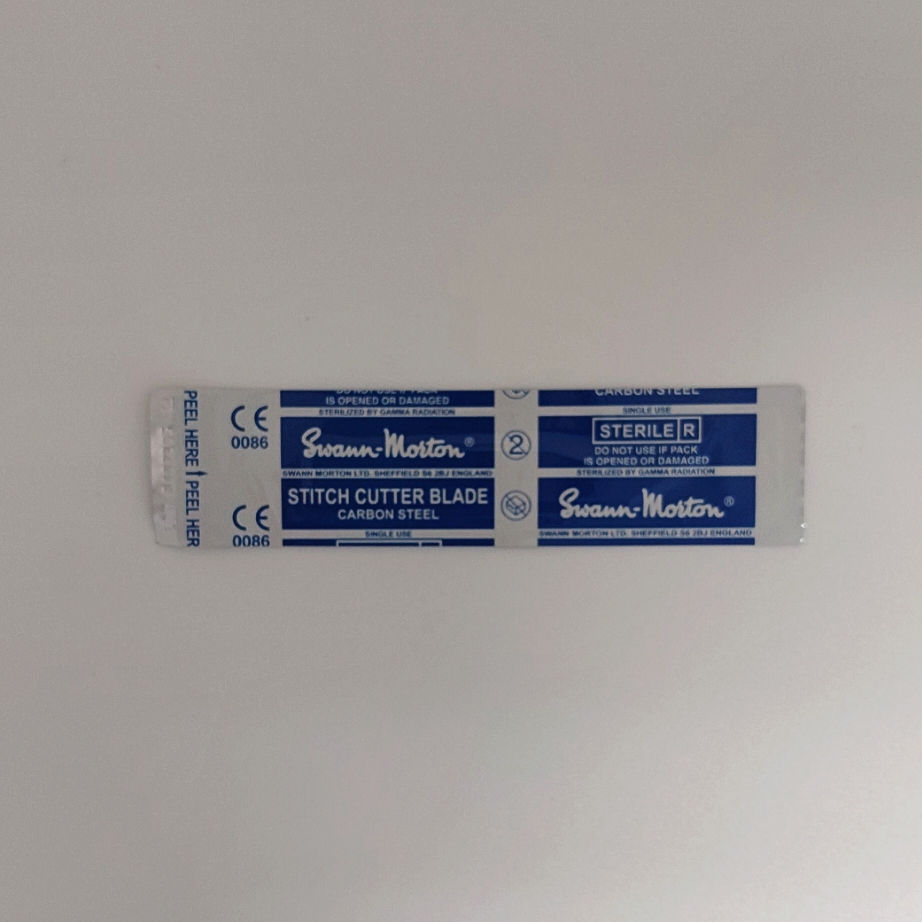 Stitch Cutter | Luminous Skin Cancer