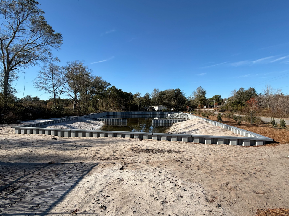 Vinyl Sheet Pile Stabilization for a Stormwater Retention Pond and ...