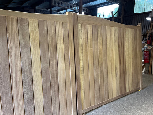 Hardwood Uneven Split Driveway Gates In 70mm Iroko. The Asymmetrical ...
