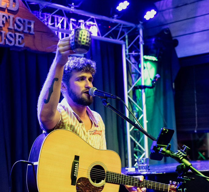 Alex Napier on the Main Stage | OldFloridaFishHouse