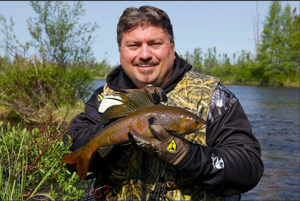 World Record Arctic Grayling Caught At Munroe Lake Lodge