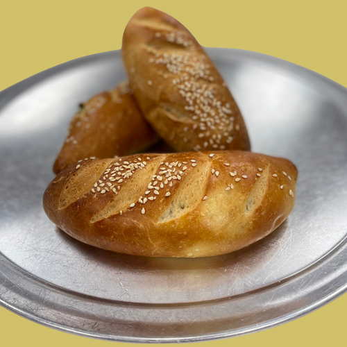2 Filled Bolillo with Creamcheese and Jalapeños | Alebrijes Bakery