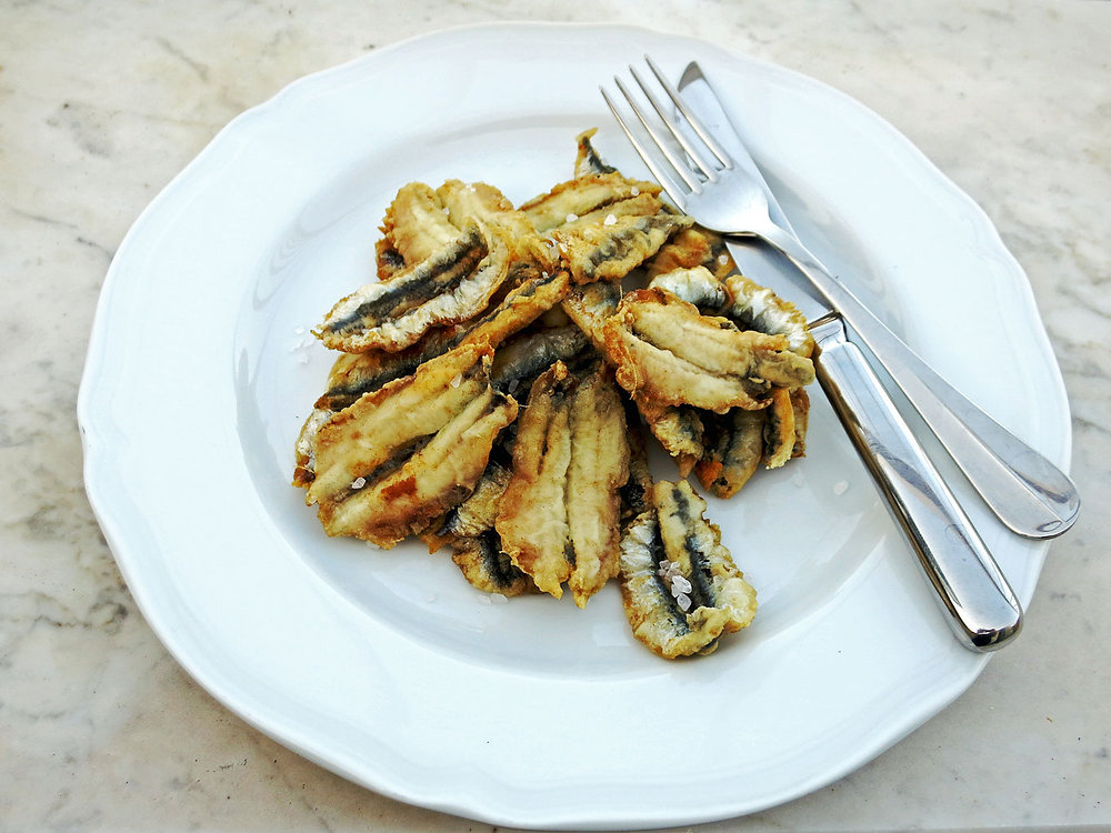 Pan fried fresh anchovy fillets