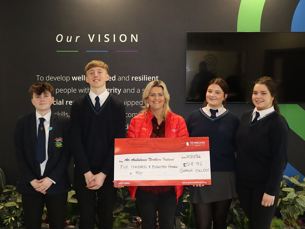 Students present fund-raising cheque to Air Ambulance Northern Ireland