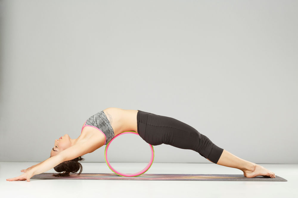 WHAT IS THE BEST YOGA WHEEL POSE FOR BACK PAIN RELIEF?