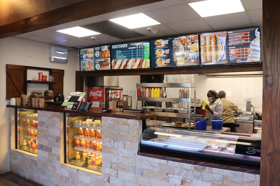 Elto-Towers - Caresso Carwash. OK Foods. Patriot Coffee. Kroonplaas ...