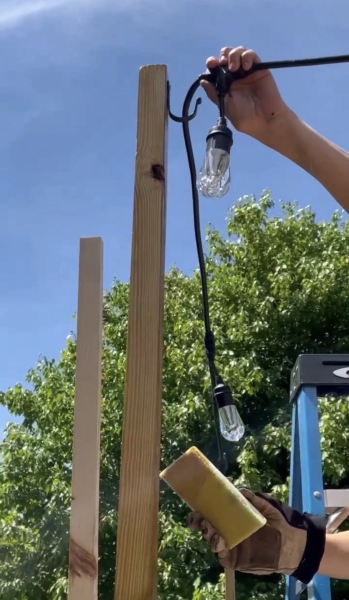 DIY planters with poles for string lights