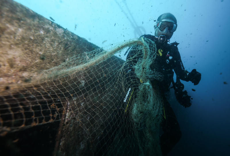Divers Find a Dark Secret at the Bottom of "The Great Blue Hole"