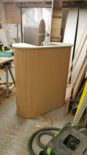 Rippled effect reception desk | Elegance Woodworking