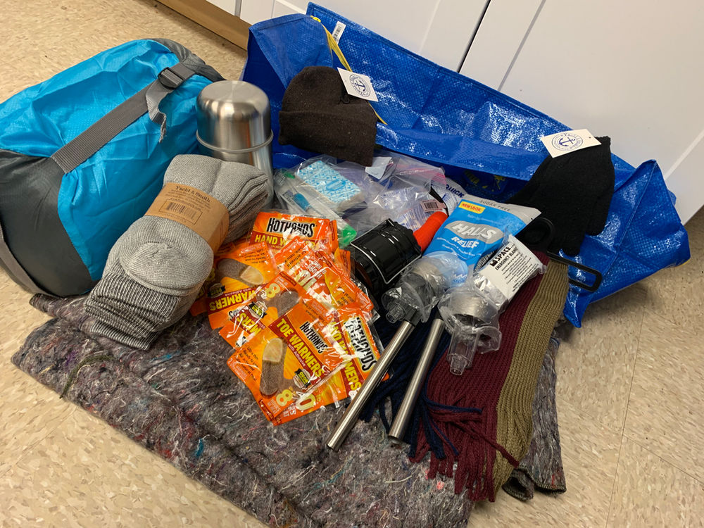 Cold Weather Kits, Camping Kits, and Tarp Kits for Camp Fire Survivors