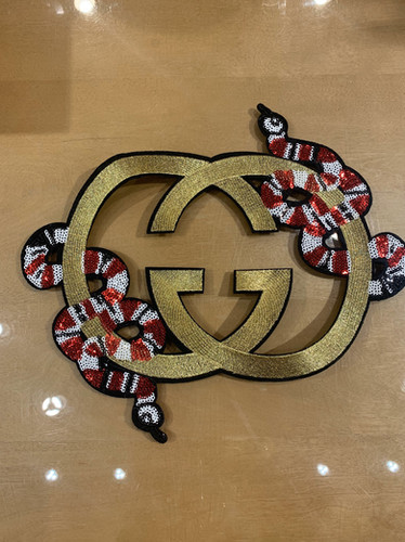 Gucci Signs W/ Snakes Inspired Patch | The Woke Brand