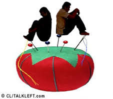 SITTING ON PINS AND NEEDLES