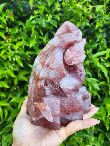 Fire in rose quartz dragon on castle | CrystaLandnz