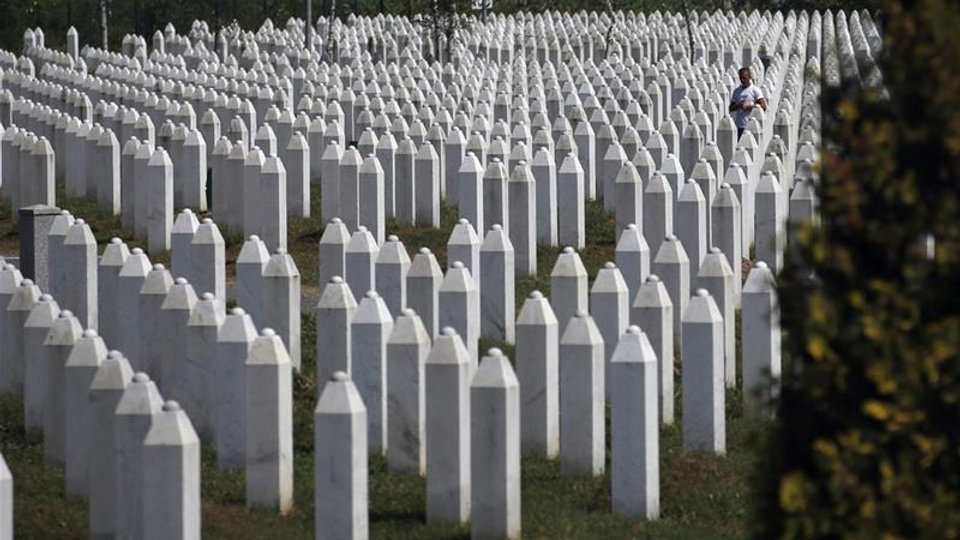 What are the 10 stages of genocide?