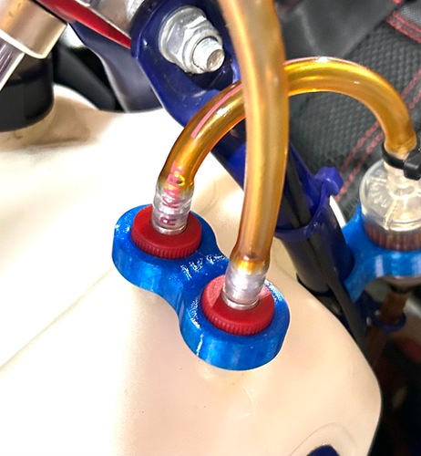 OTK fuel tank outlet clamp | Jb Kart Racing
