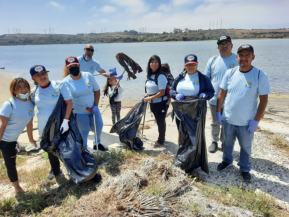 Lagoon Clean Up – 1,570 Pounds of Trash and Weeds Removed!
