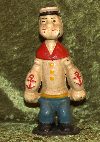 Antique, Popeye the sailor man, cast-iron bank. Colors are great ...