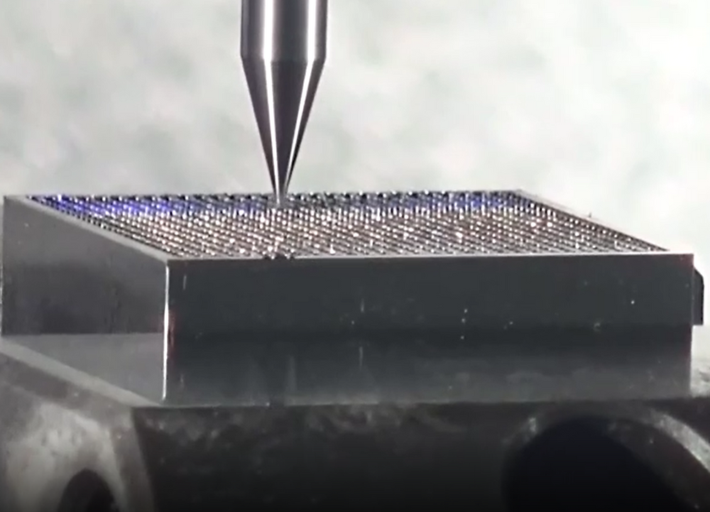 Machining 20 micron by 300 micron tall features, 841 times on the ...