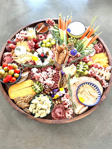 Extra large choices. Round serves about 25. | Perrells Provisions