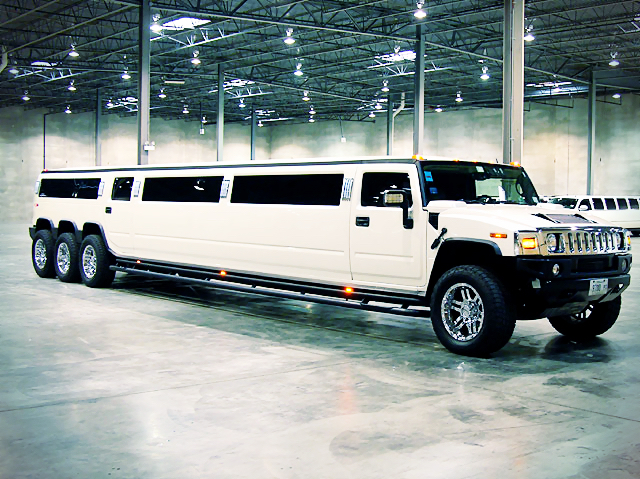 Ready For The King of All Hummer Limos? Check Out Our Triple Axle!