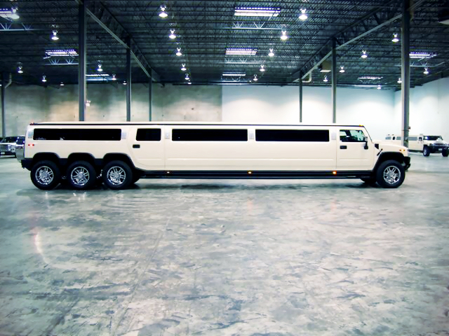 Ready For The King of All Hummer Limos? Check Out Our Triple Axle!