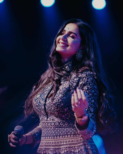 Buy Singer Kinjal Dave Party Wear Blue Sequence Work Top With Lehengas ...