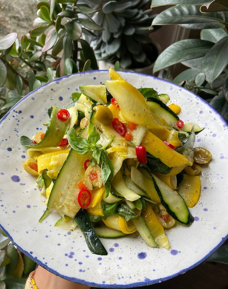 Courgette ribbon salad with green olives, basil & chilli