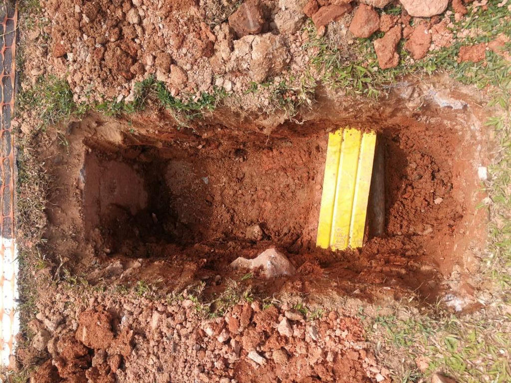 Carrying out trial holes according to Authority covid-19 safety measures.